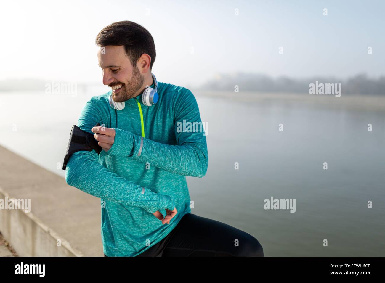 Man running on mobile phone hi-res stock photography and images - Alamy