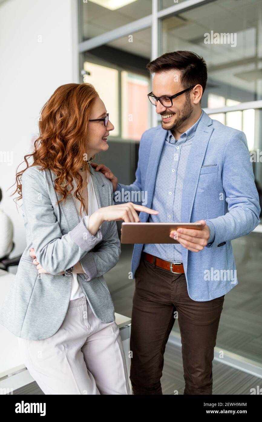 Business people having fun and chatting at workplace office Stock Photo ...