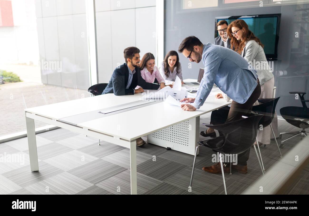 Business people having board hi-res stock photography and images - Alamy
