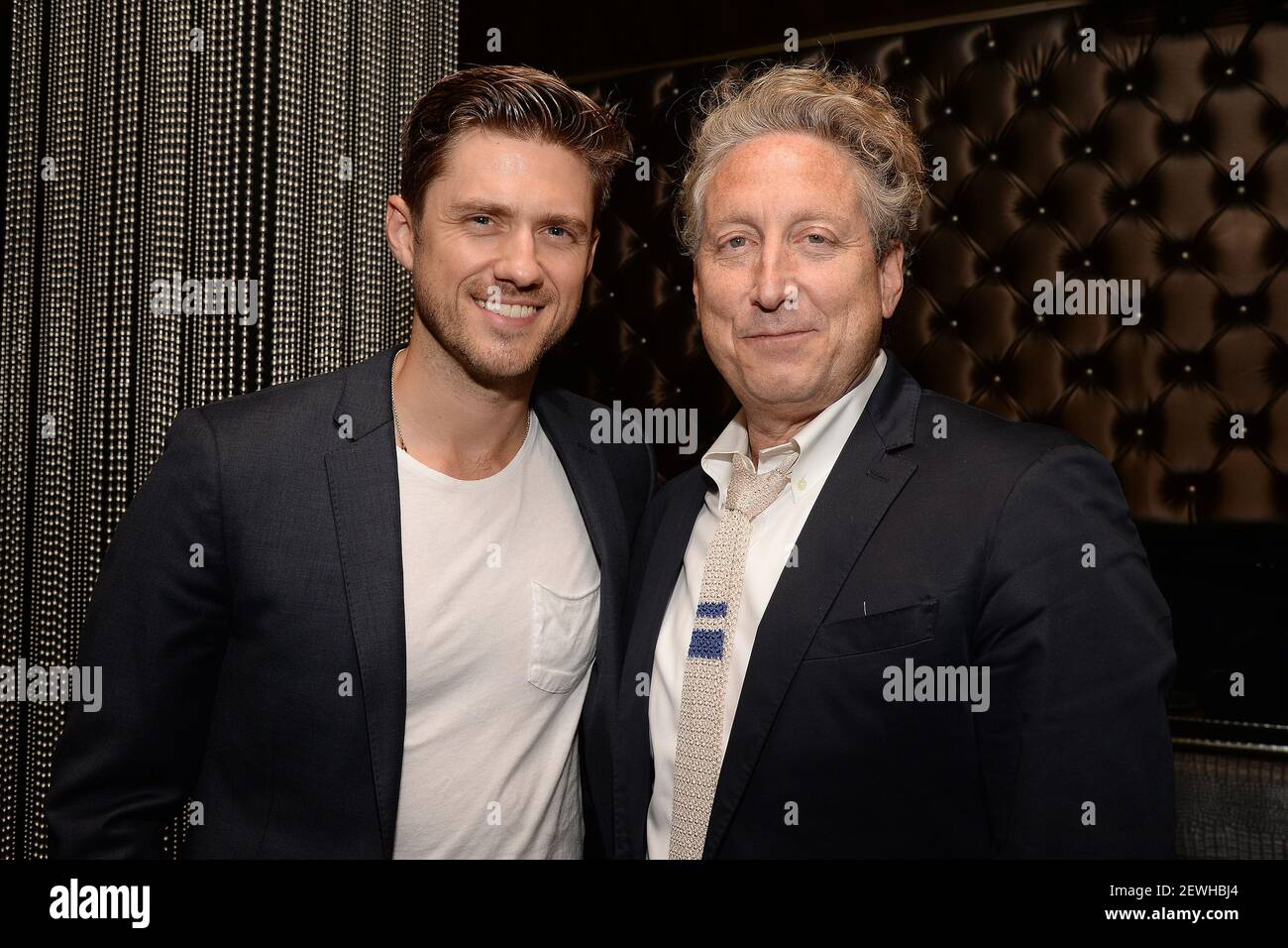 Actor Aaron Tveit and Bernard Telsey pose together after speaking ...