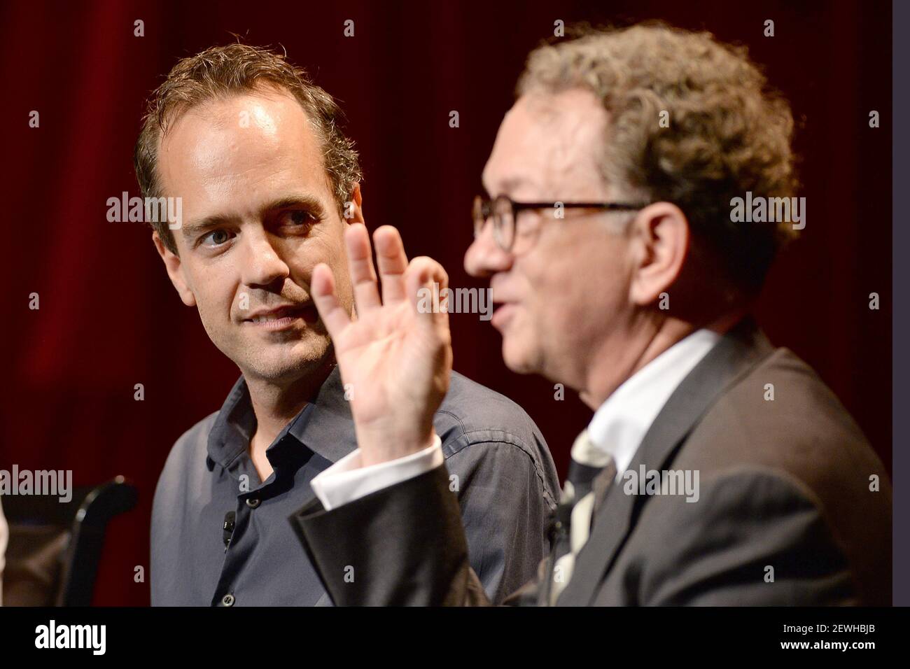 Alex Rudzinski (L) listens to William Ivey Long as he talks during FOX ...