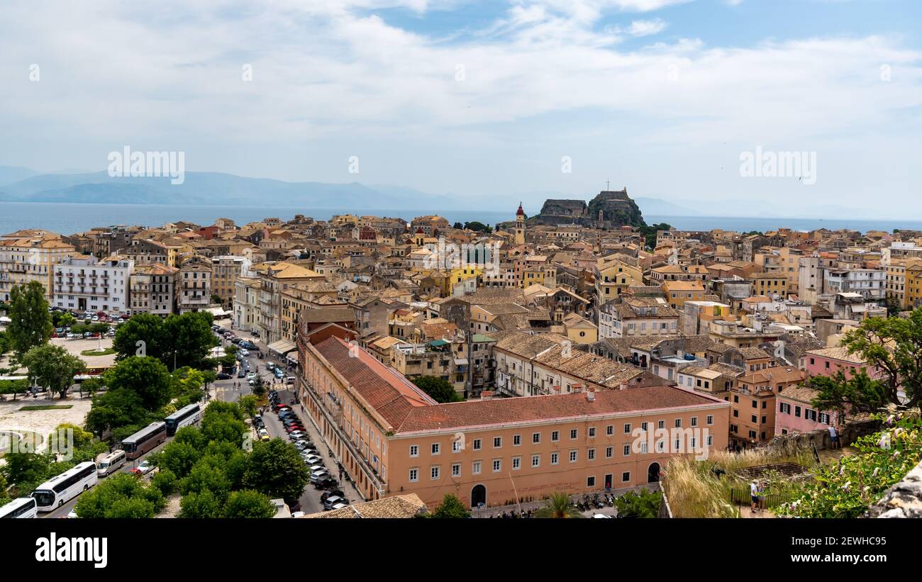 The beautiful historic buildings on the island of Corfu with a fortress ...