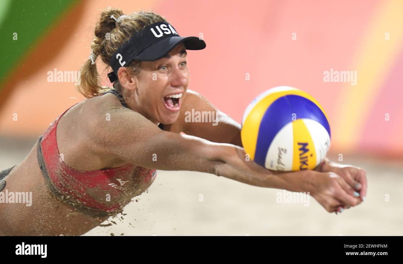 April Ross dives for the ball in the second set as she and U.S ...