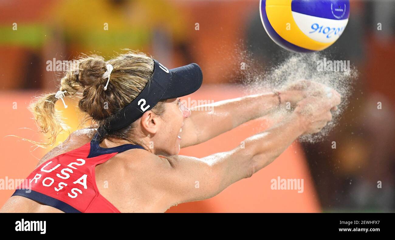 April Ross dives for the ball in the second set as she and U.S ...