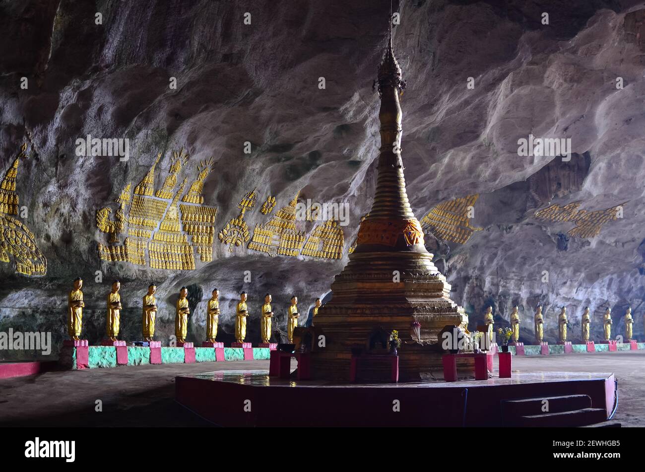 a beautiful shot of Saddan cave with statues and a small temple Hpa An ...