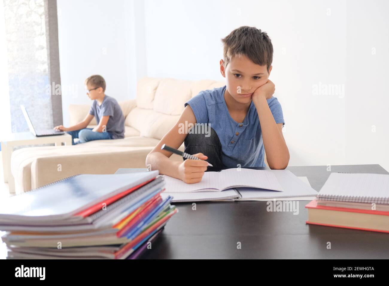 Children doing school homework at home. Online learning, distance ...