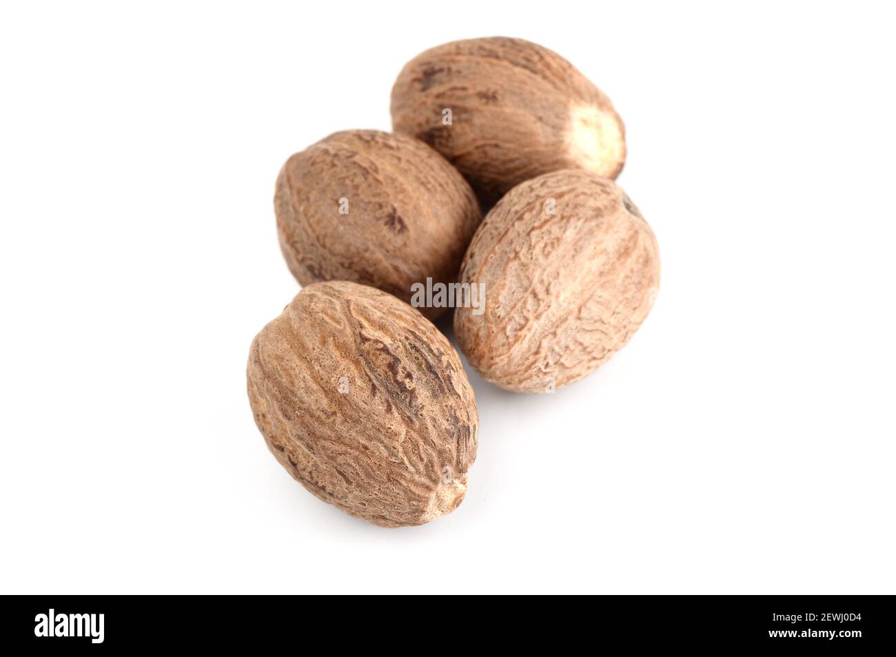 Nutmeg isolated on white background. Close up Stock Photo - Alamy