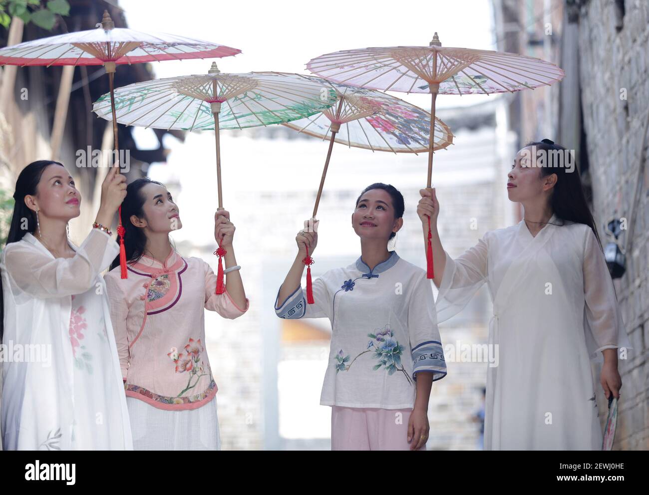 Models present Han-style costumes, or Hanfu, during a traditional dress ...
