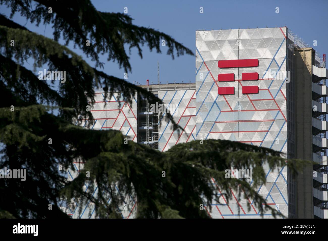 A logo sign outside of the future headquarters of Telecom Italia (TIM ...