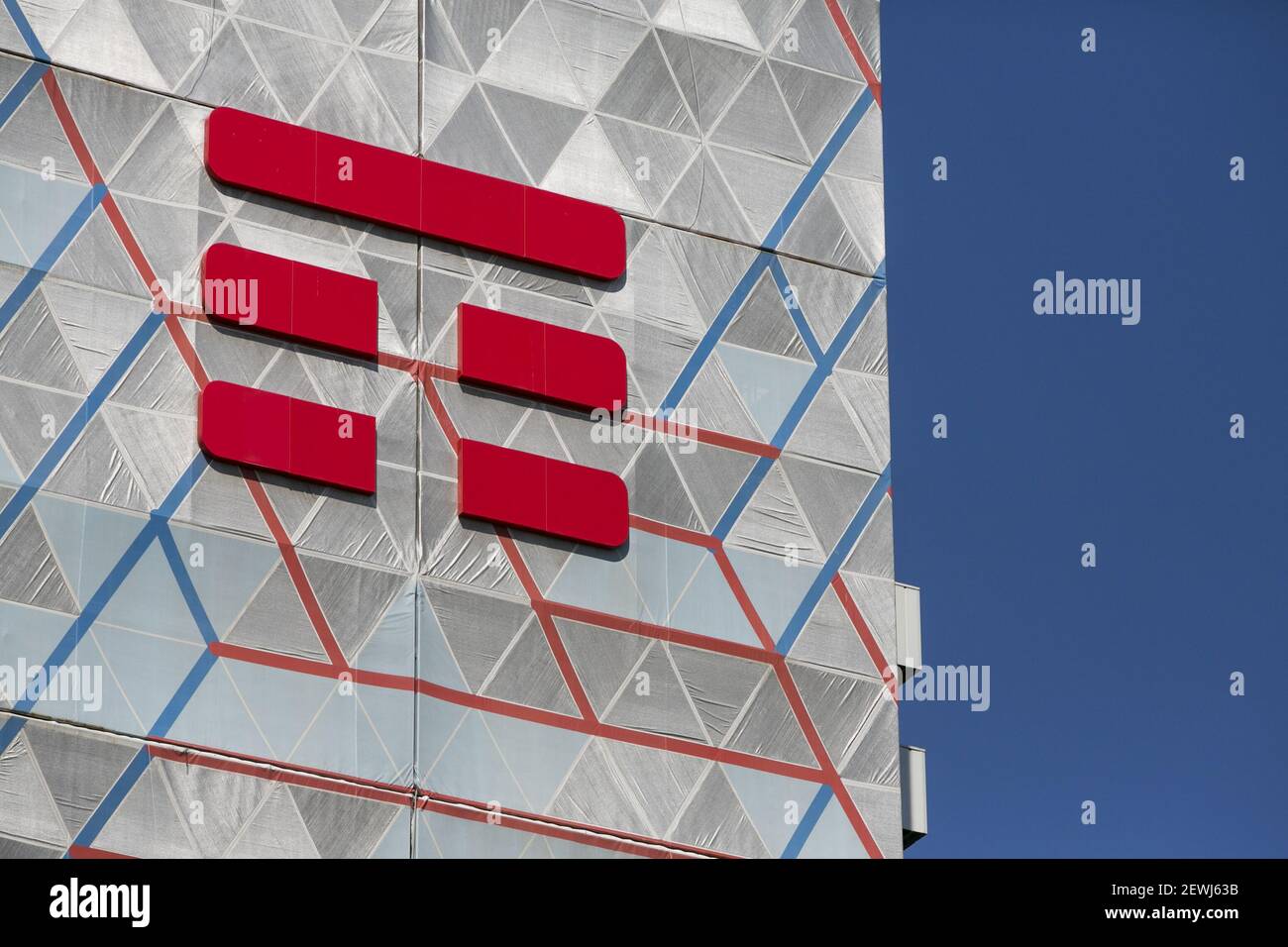 A logo sign outside of the future headquarters of Telecom Italia (TIM ...