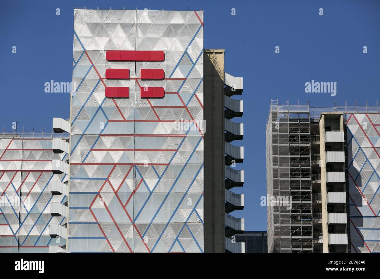 A logo sign outside of the future headquarters of Telecom Italia (TIM ...