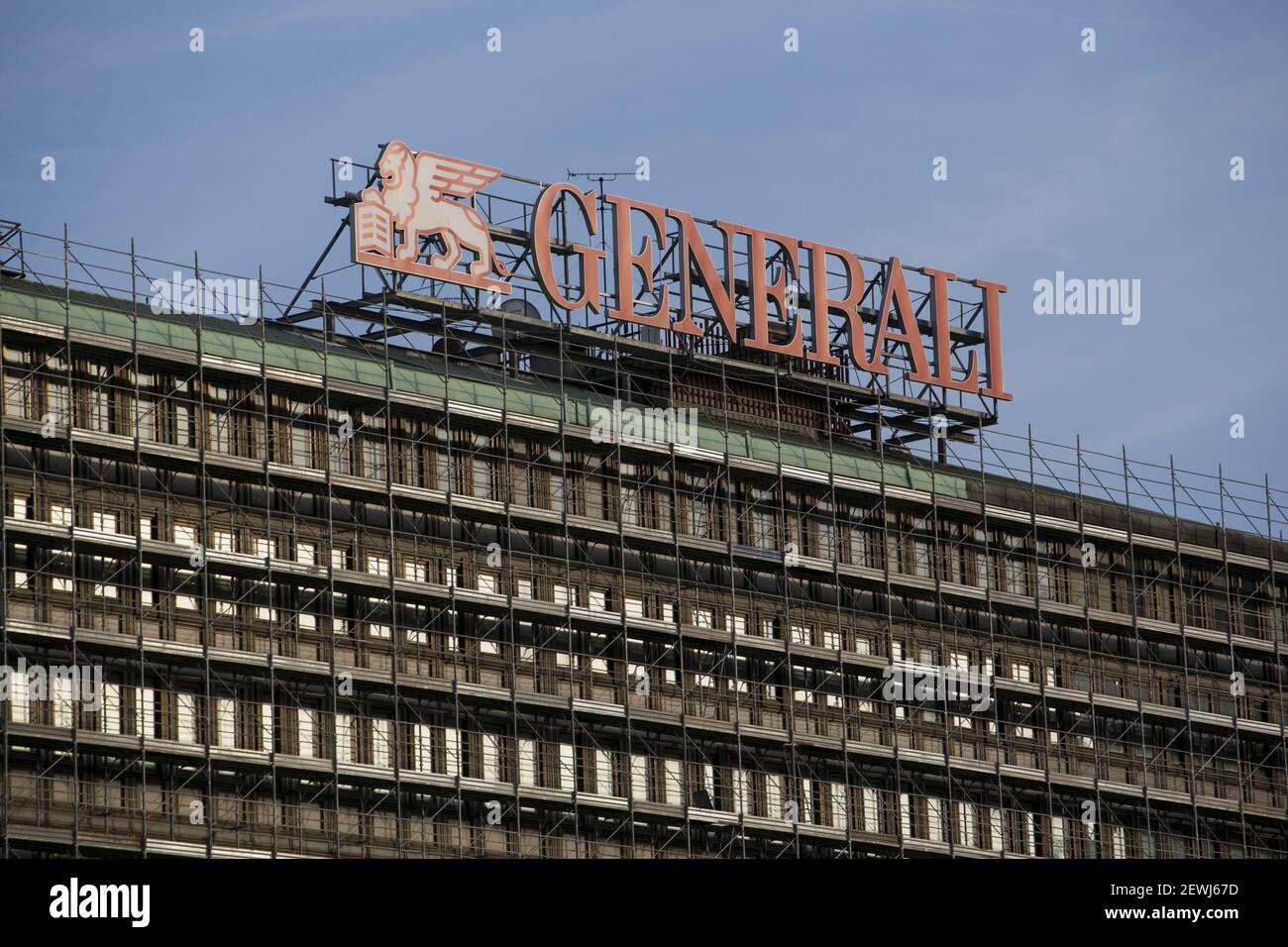 A logo sign outside of a facility occupied by the Generali Group in ...