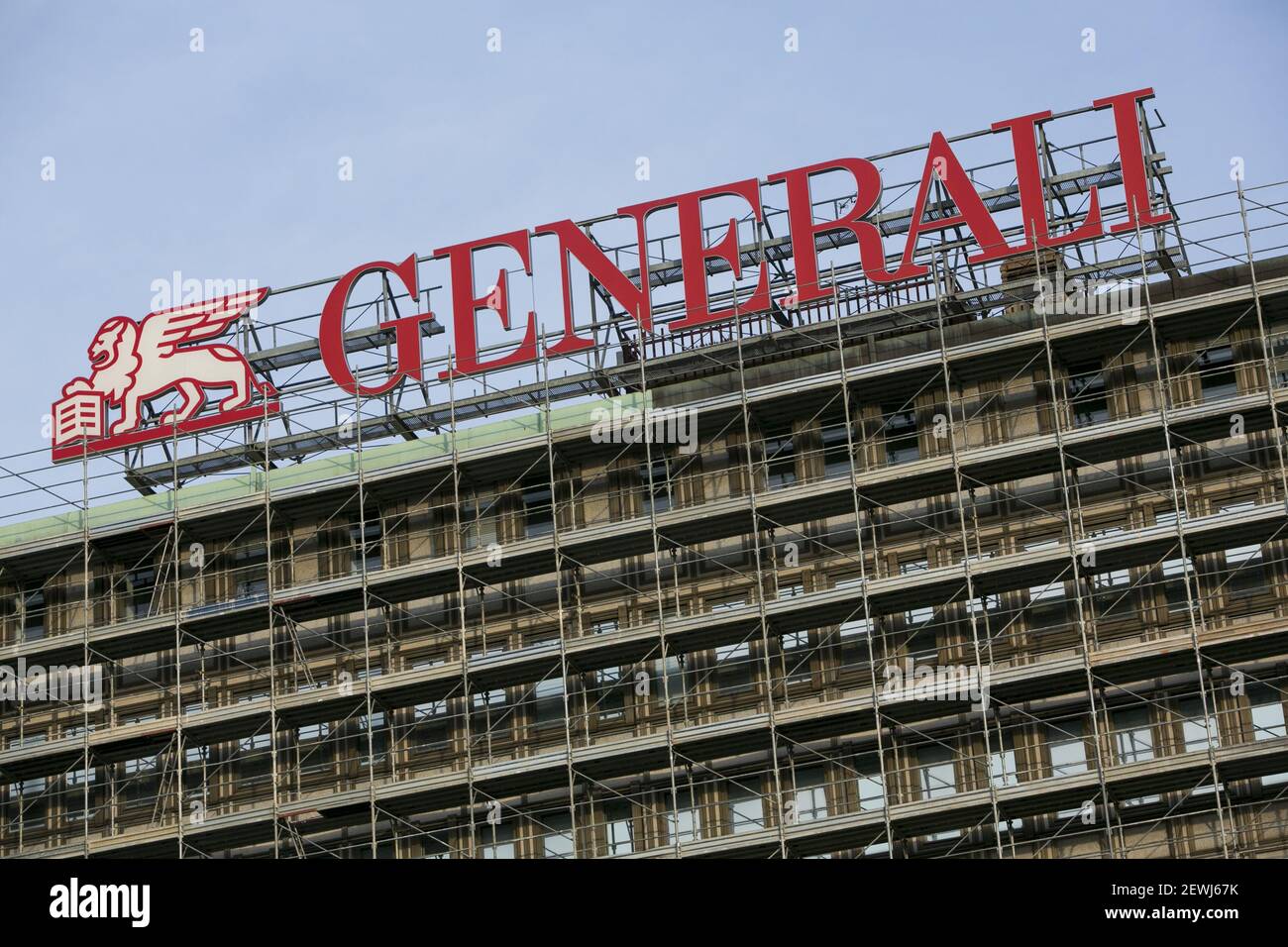 A logo sign outside of a facility occupied by the Generali Group in ...