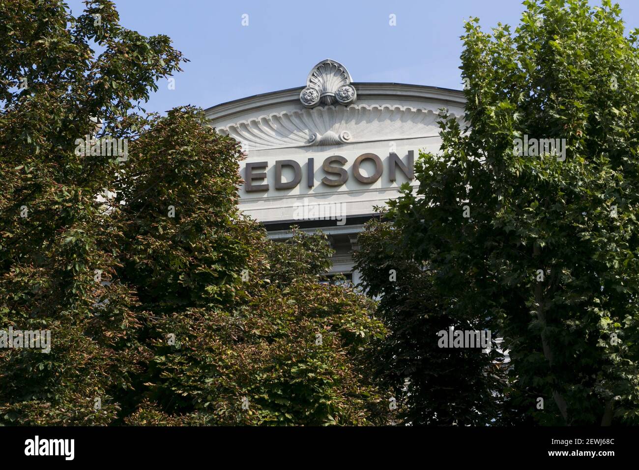 A logo sign outside of the headquarters of Edison S.p.A. in Milan ...