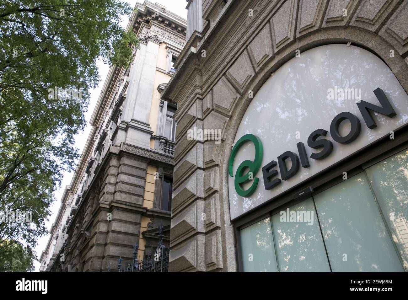 A logo sign outside of the headquarters of Edison S.p.A. in Milan ...
