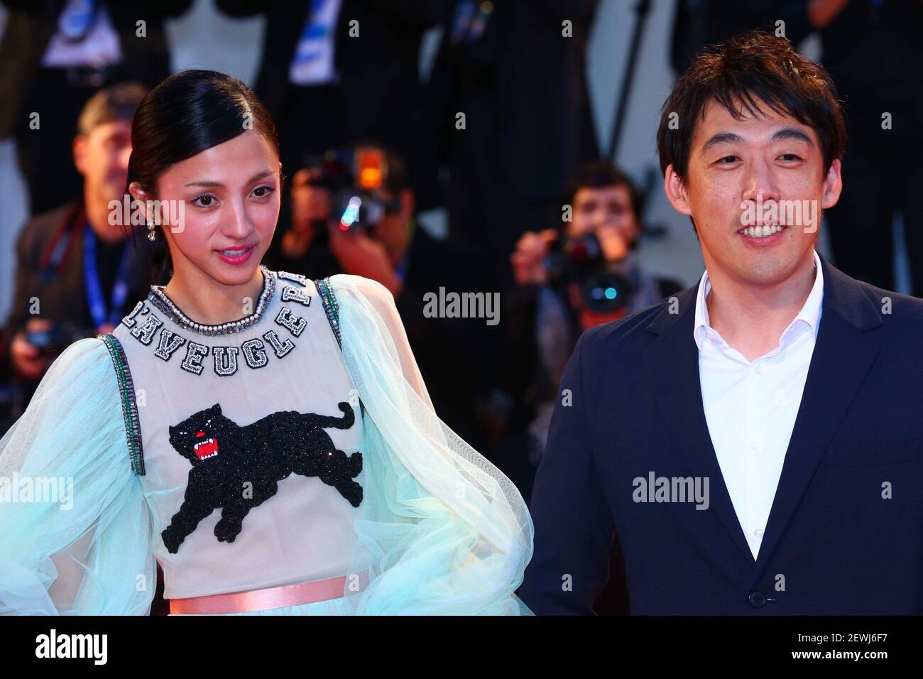 Actress Hikari Mitsushima (L) and director Kei Ishikawa arrive for the ...