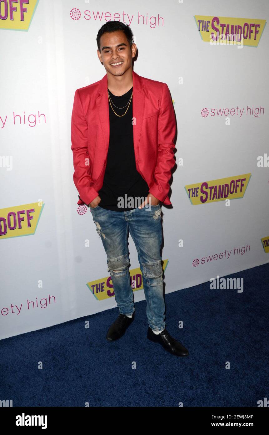 Julian Works at "The Standoff" Premiere at the Regal Cinemas in Los ...