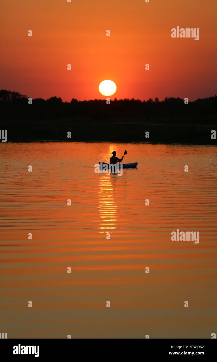 Man floating water silhouette hi-res stock photography and images - Alamy