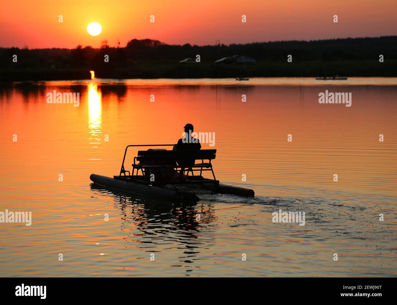 Man floating water silhouette hi-res stock photography and images - Alamy