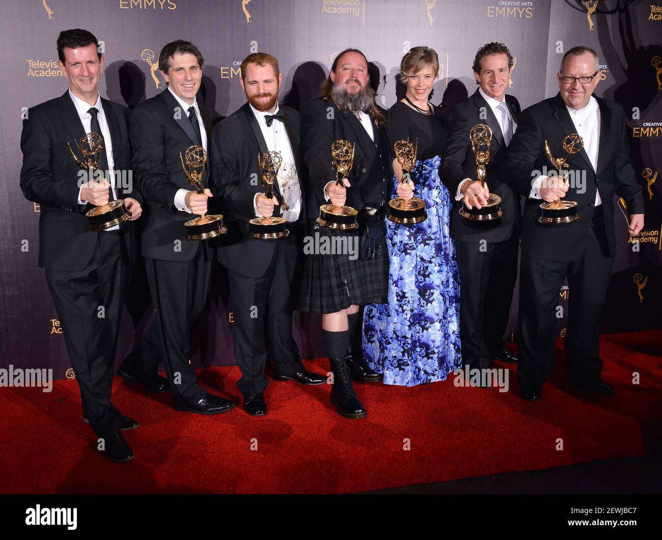 The team from "Game of Thrones" poses in the press room with their ...