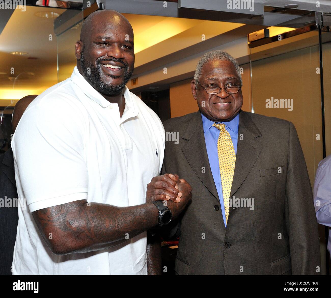 L-R: Former NBA stars Shaquille O'Neal and Willis Reed attend the BGC ...