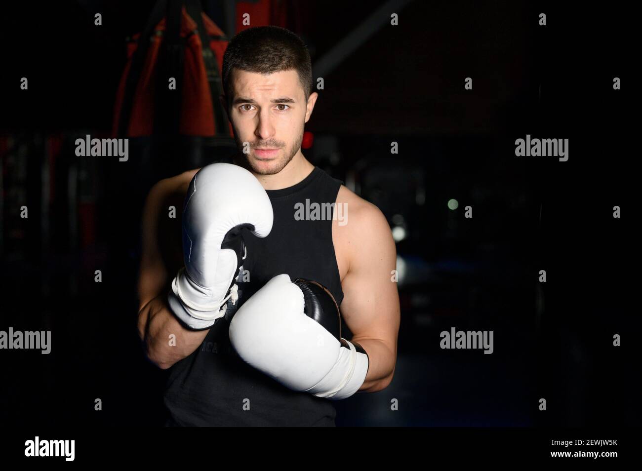 Professional young boxer in fight hi-res stock photography and images ...