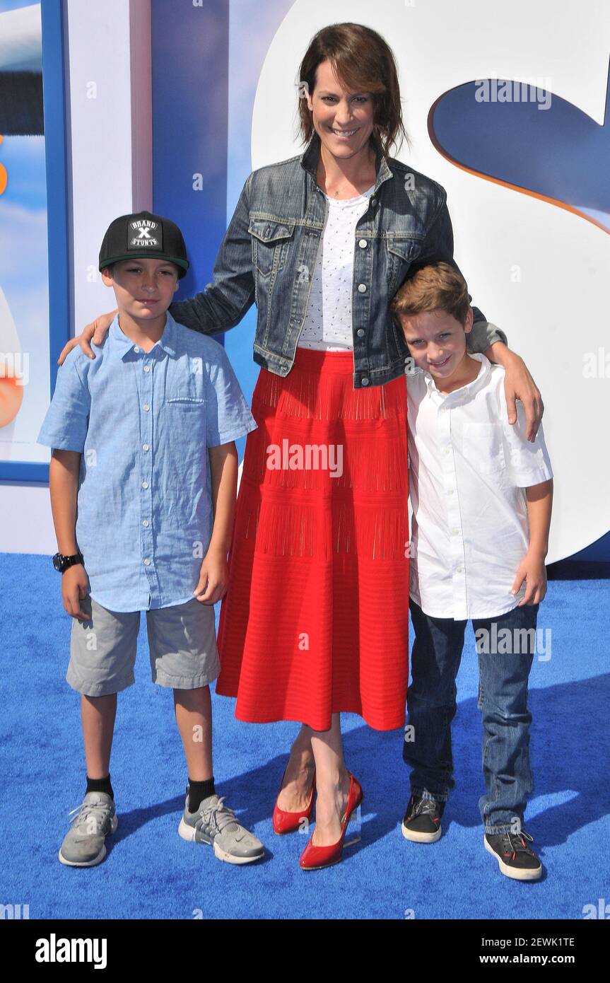 (L-R) Cash Alexander Allen, Annabeth Gish and Enzo Edward Allen arrives ...