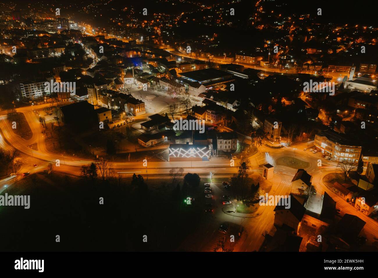 An aerial beautiful Tuzla cityscape in Bosnia and Herzegovina at night ...