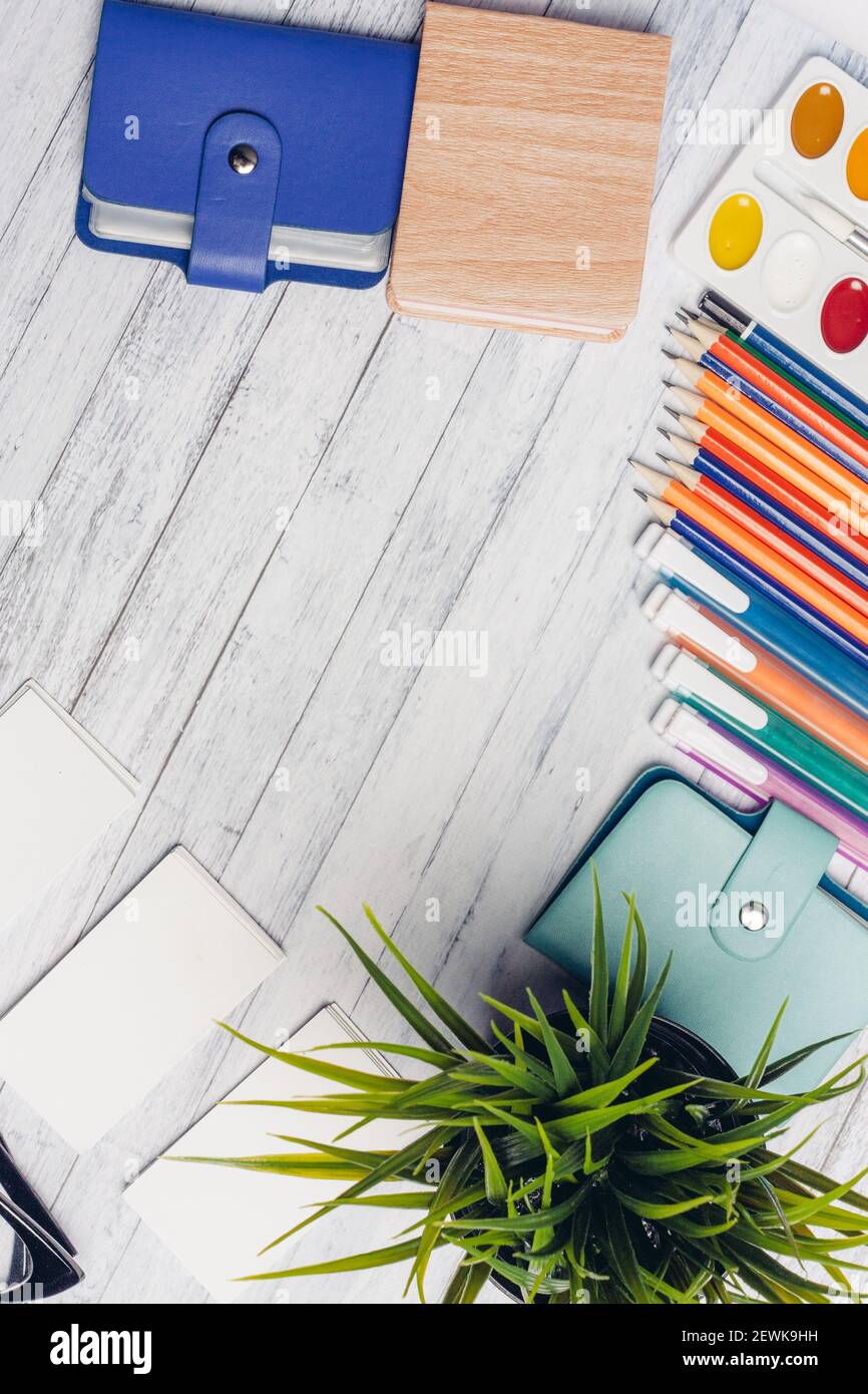 stationery in the office on the table business card notepad and flower ...