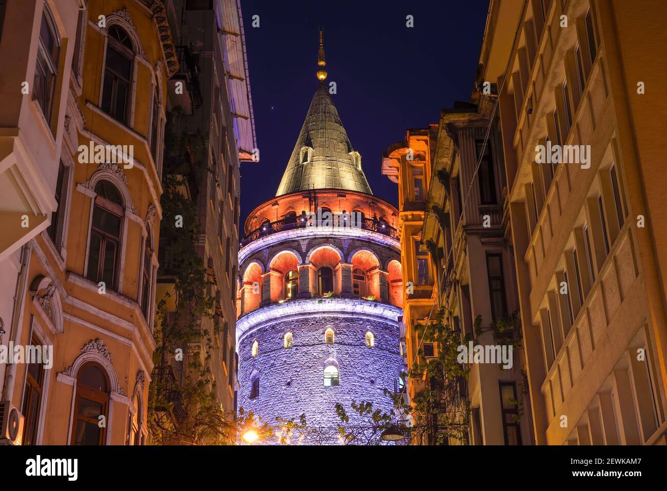 View of the Galata Tower in the historic district in Istanbul at night ...