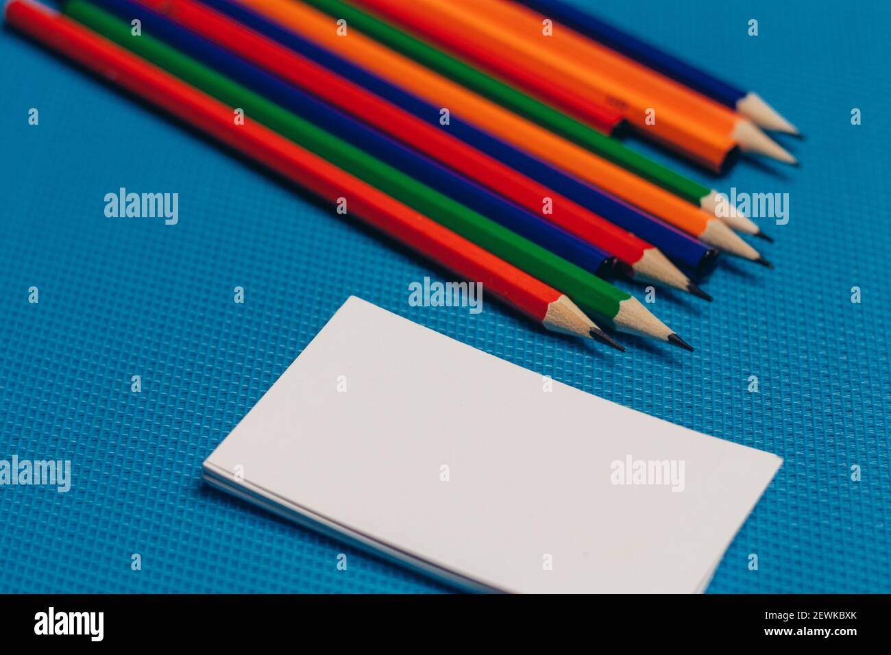 colored pencils business cards blue background Copy Space Stock Photo ...