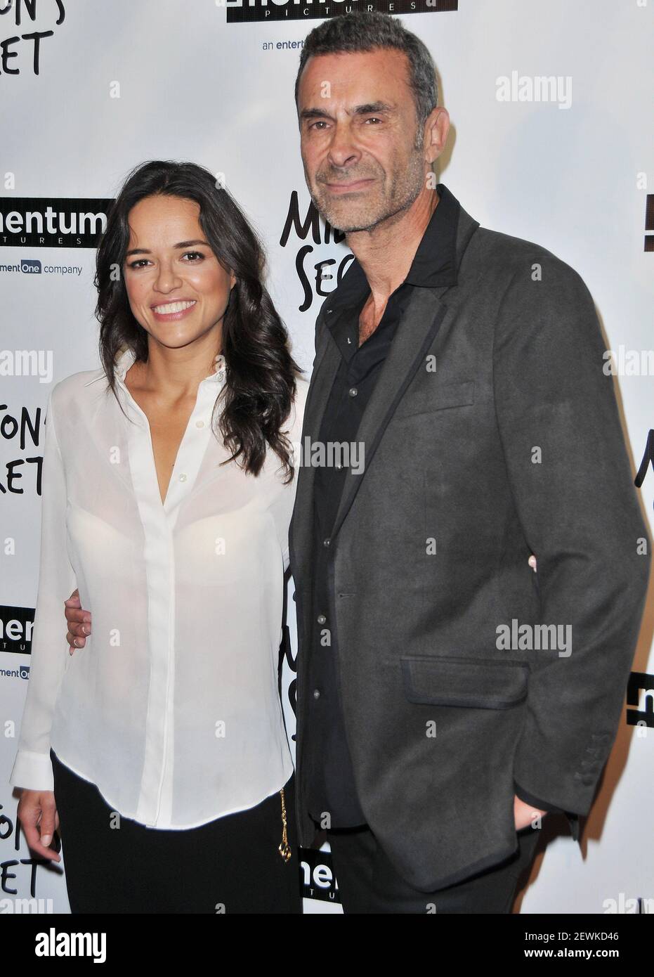 (L-R) Michelle Rodriguez and Director/Writer Barnet Bain arrives at ...