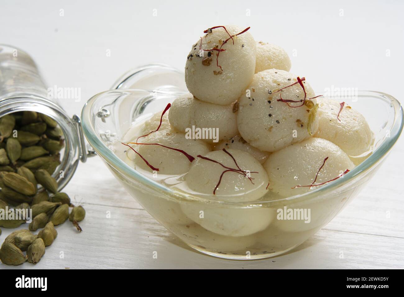 Traditional appetizing ball-shaped dumplings of Rasagulla dessert in ...