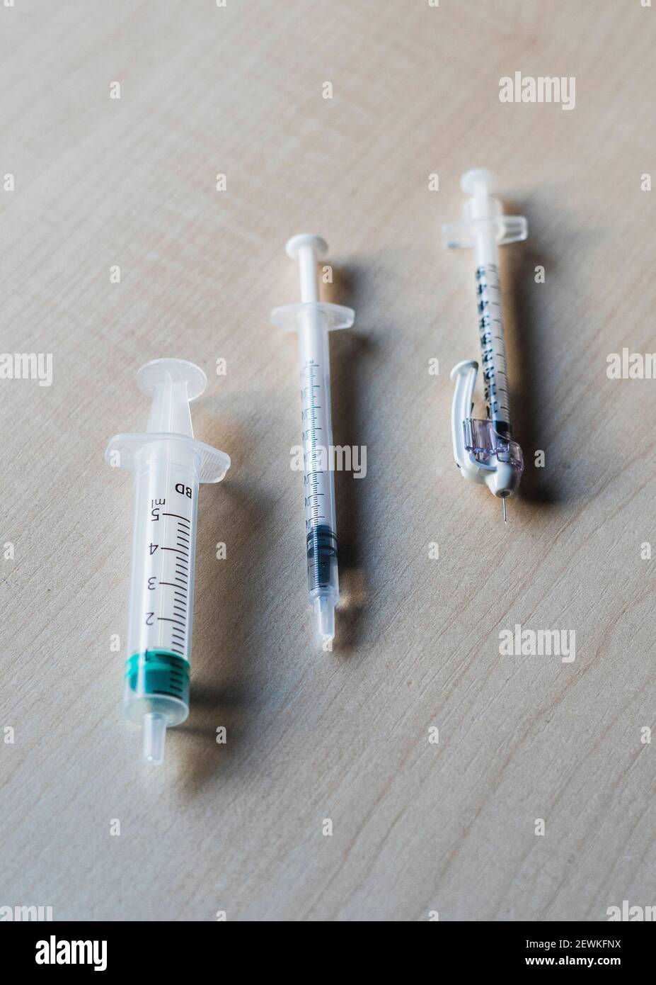 Syringes three syringes hi-res stock photography and images - Alamy