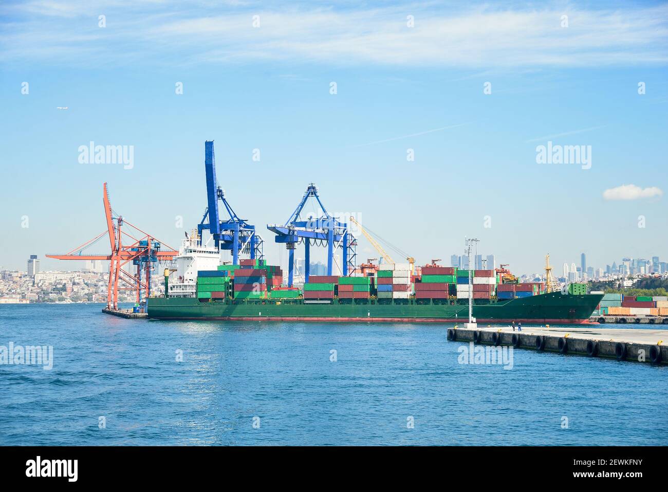 Cargo ship unloads cargo in Istanbul Stock Photo - Alamy