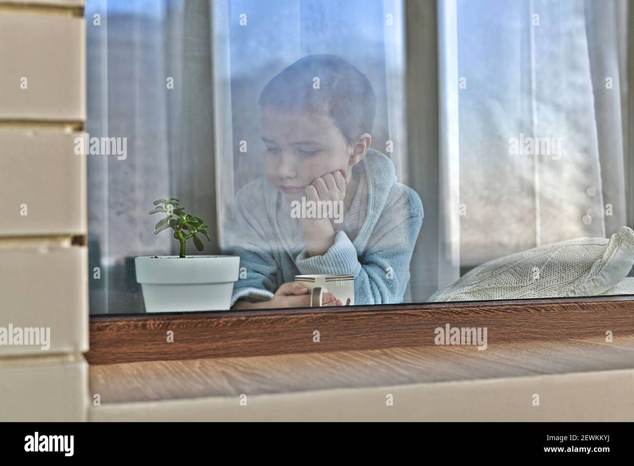 Sad looking child hi-res stock photography and images - Alamy