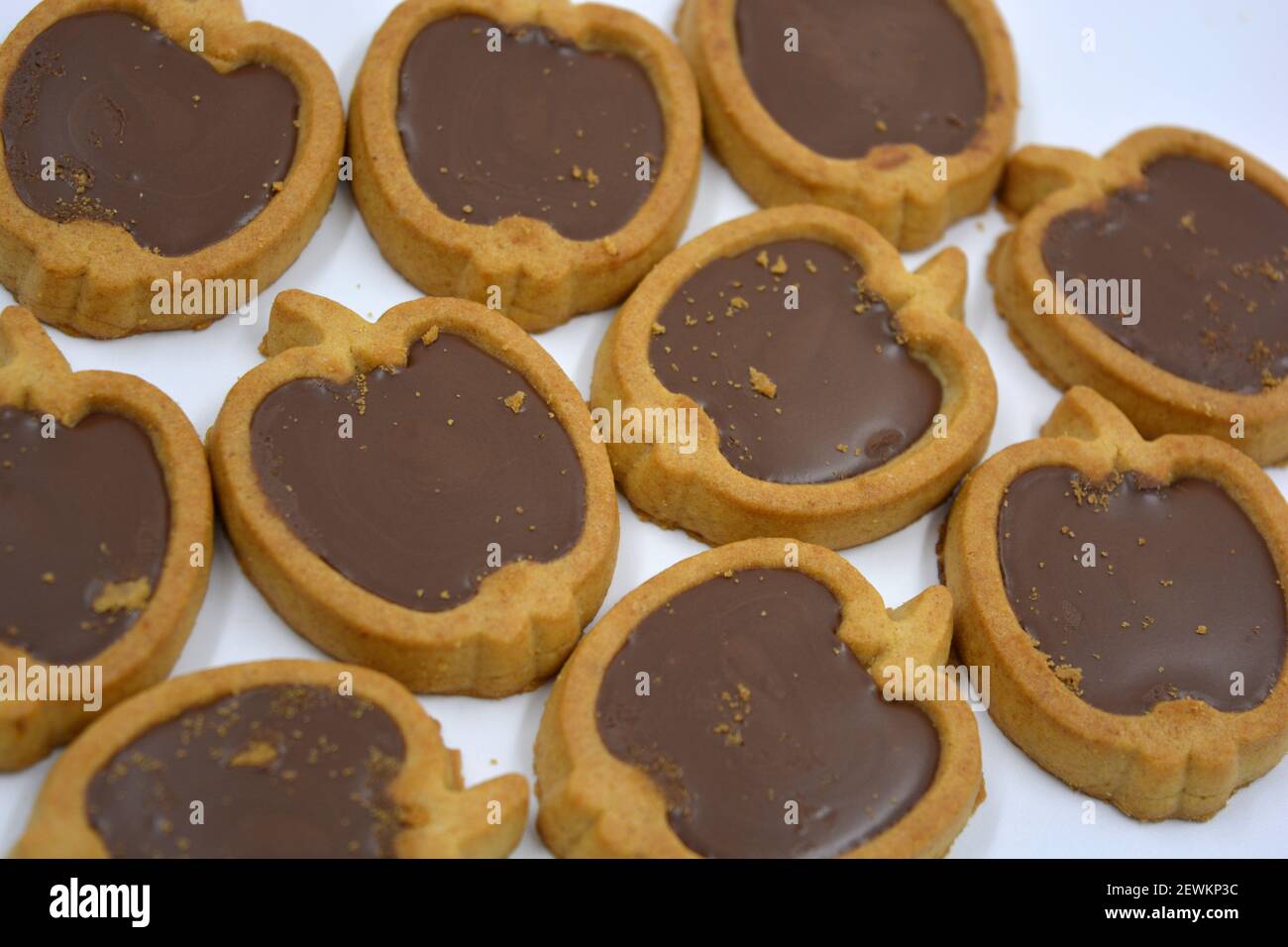 Delicious and sweet shortbread apple-shaped cookies with brown ...