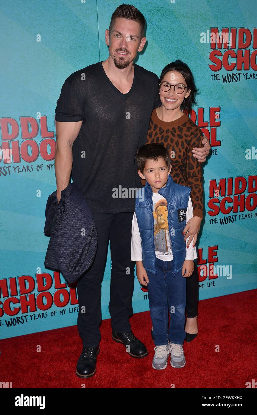 (L-R) Steve Howey, wife Sarah Shahi, son William Howey arrives at CBS ...