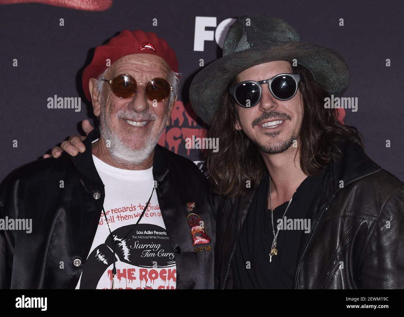 Lou Adler and Cisco Adler at the red carpet premiere of Fox's "The Rock ...