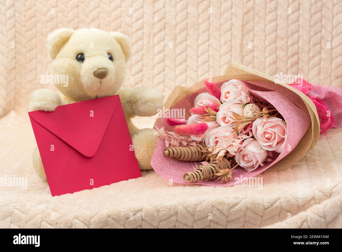 White teddy bear with flowers and envelope with congratulations Stock ...