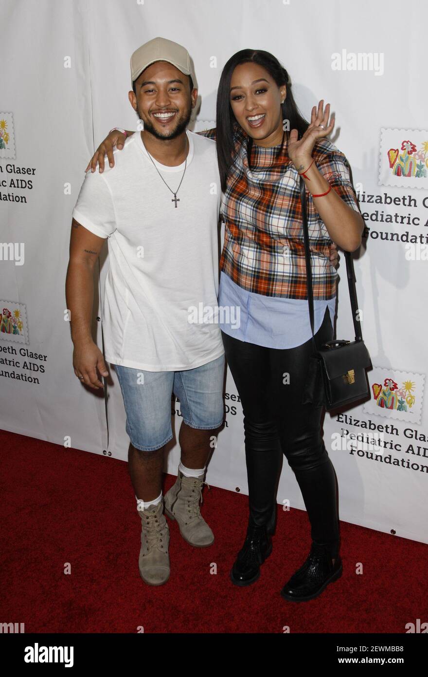 Actors Tahj Mowry and Tia Mowry attend the Elizabeth Glaser Pediatric ...