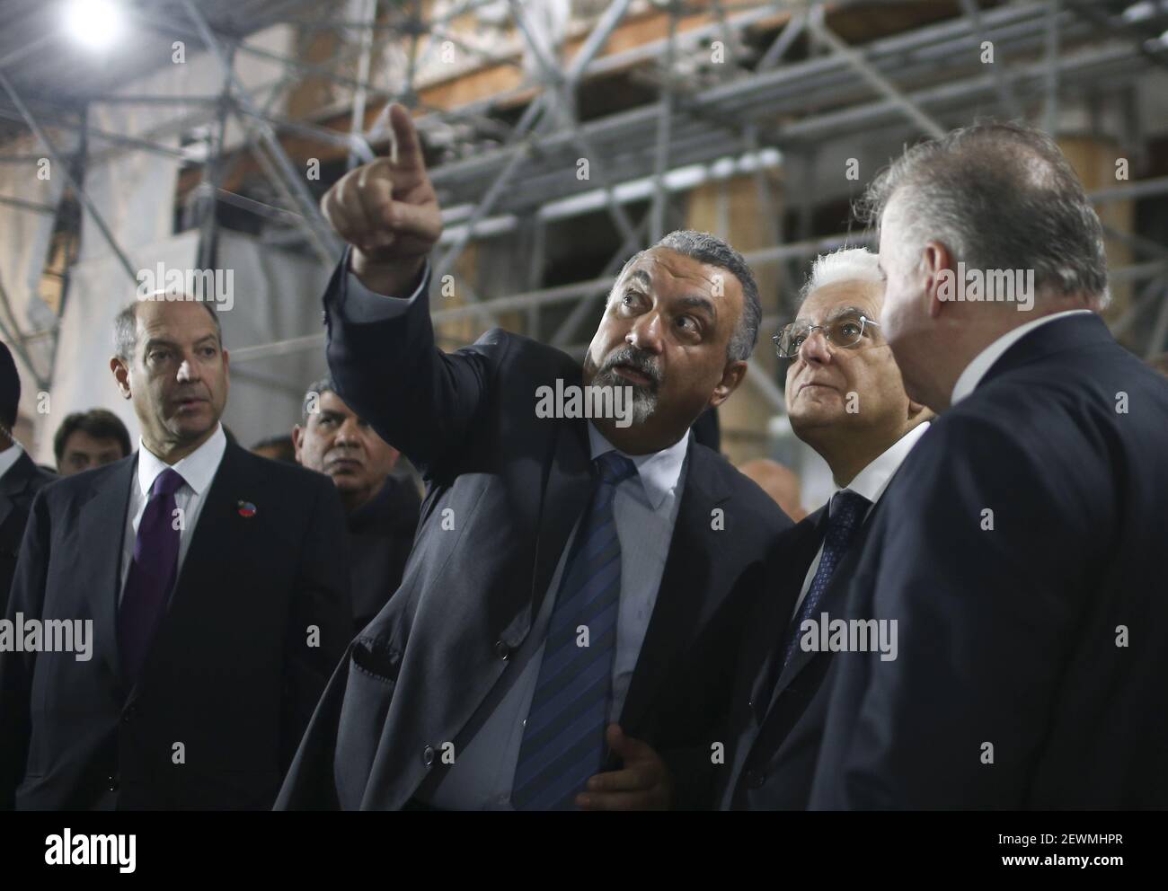 Italian President Sergio Mattarella (2nd R) visits the Church of the ...