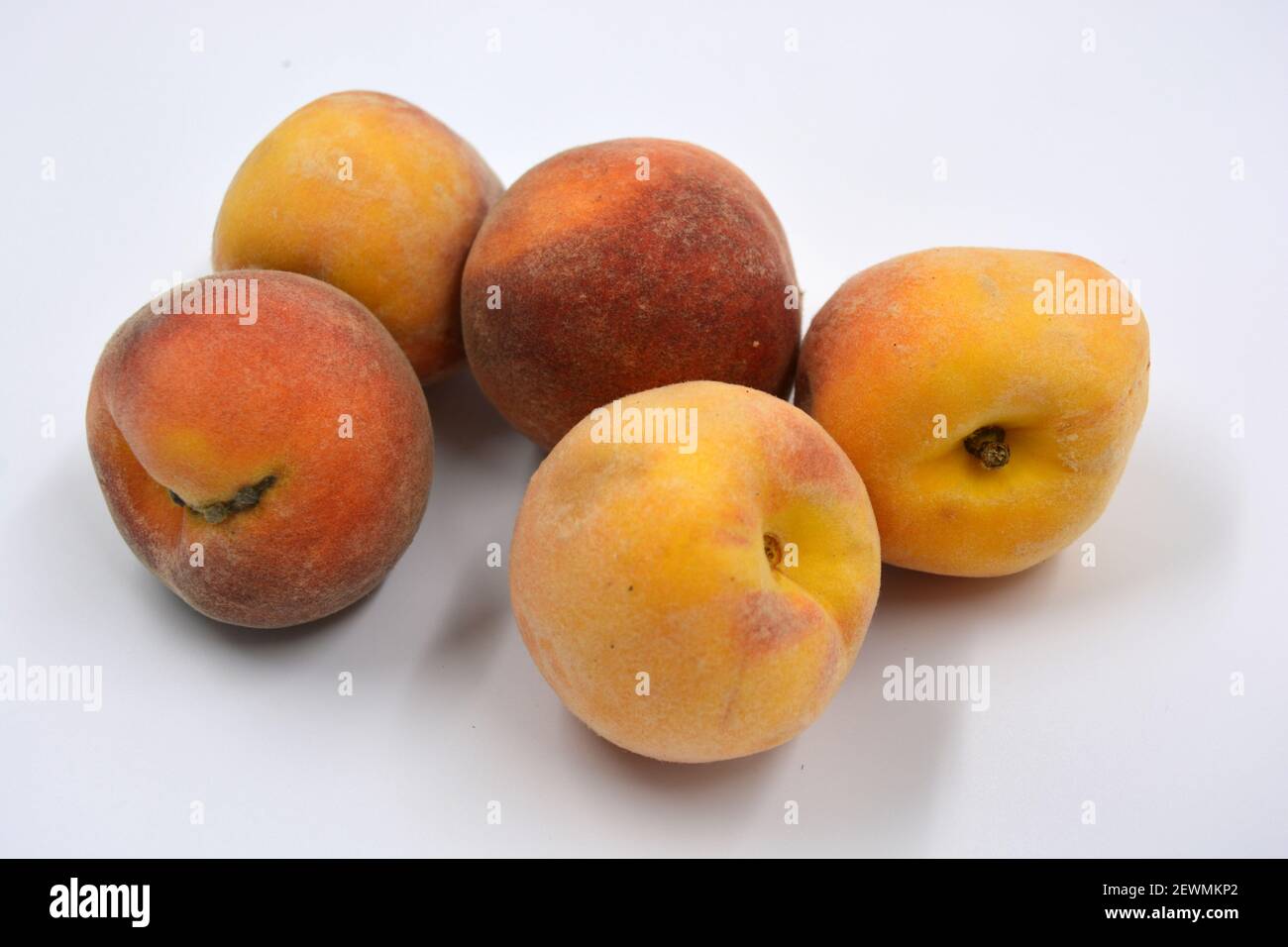 Tasty and useful fresh fruits, ripe red and orange peaches with a terry ...