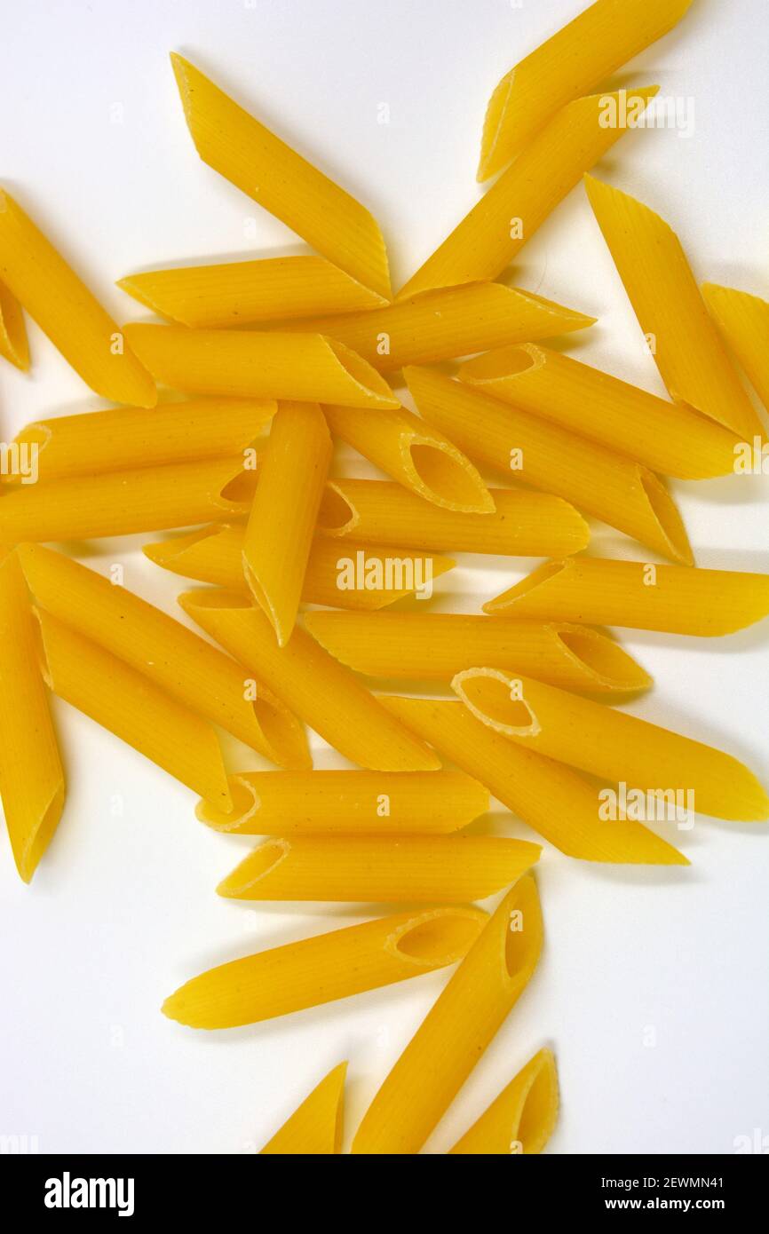 Food dry yellow Italian vermicelli, grain solid paste is located on a ...