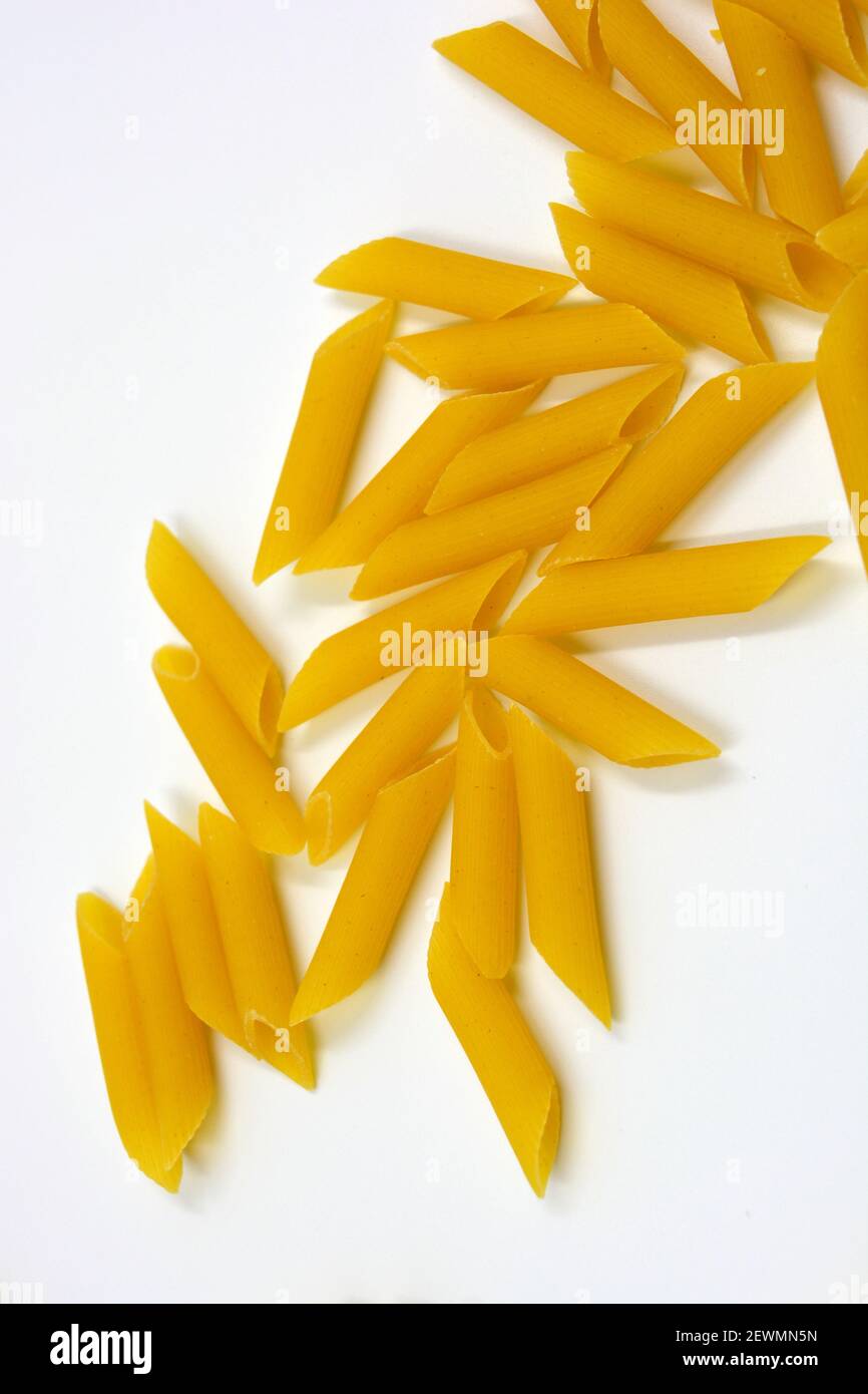 Food dry yellow Italian vermicelli, grain solid paste is located on a ...