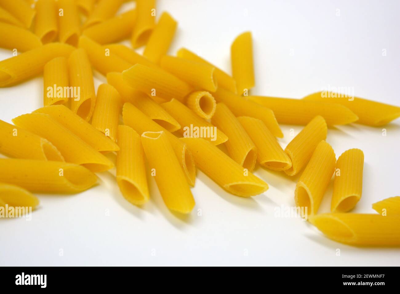 Food dry yellow Italian vermicelli, grain solid paste is located on a ...