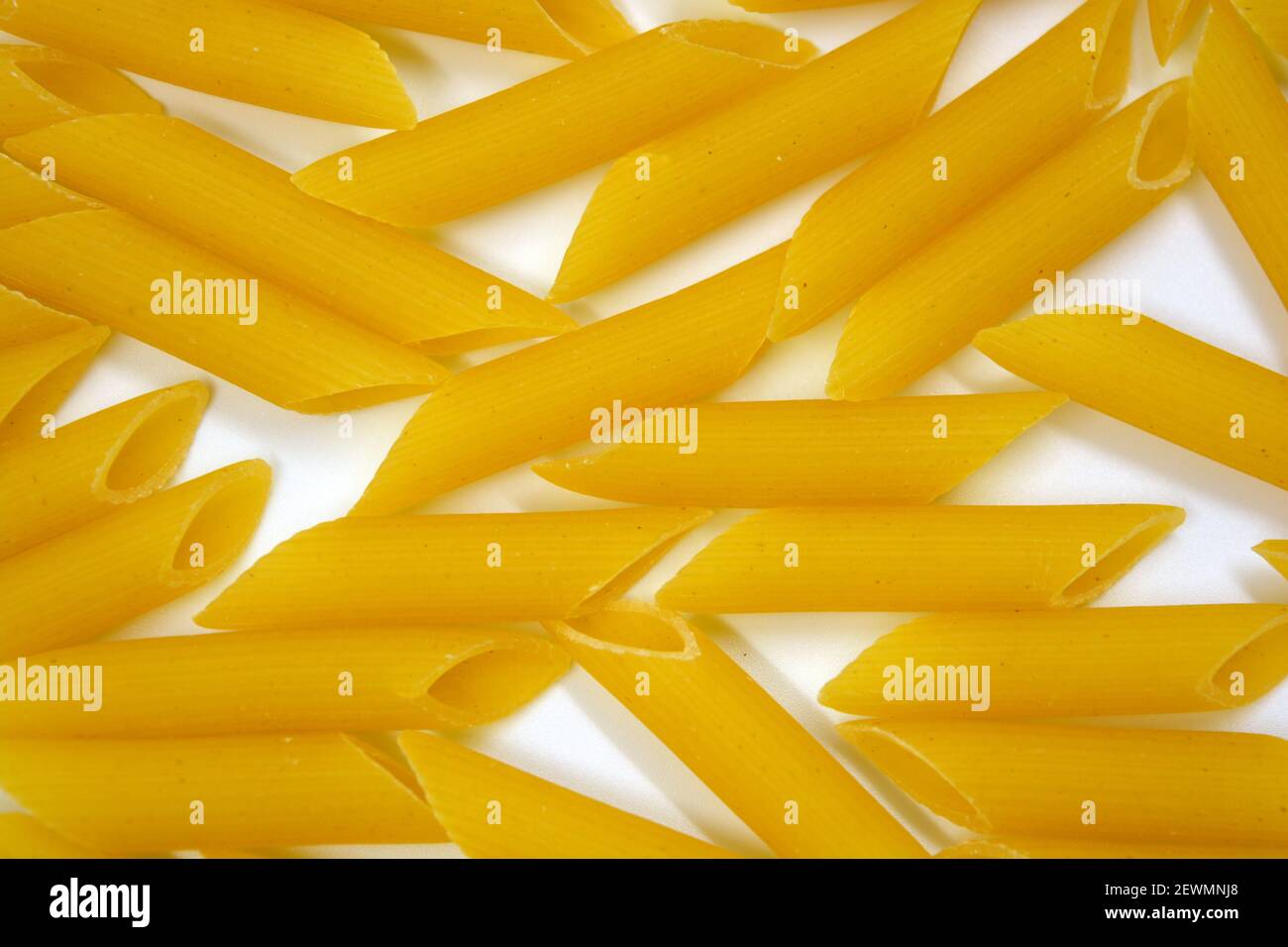 Food dry yellow Italian vermicelli, grain solid paste is located on a ...