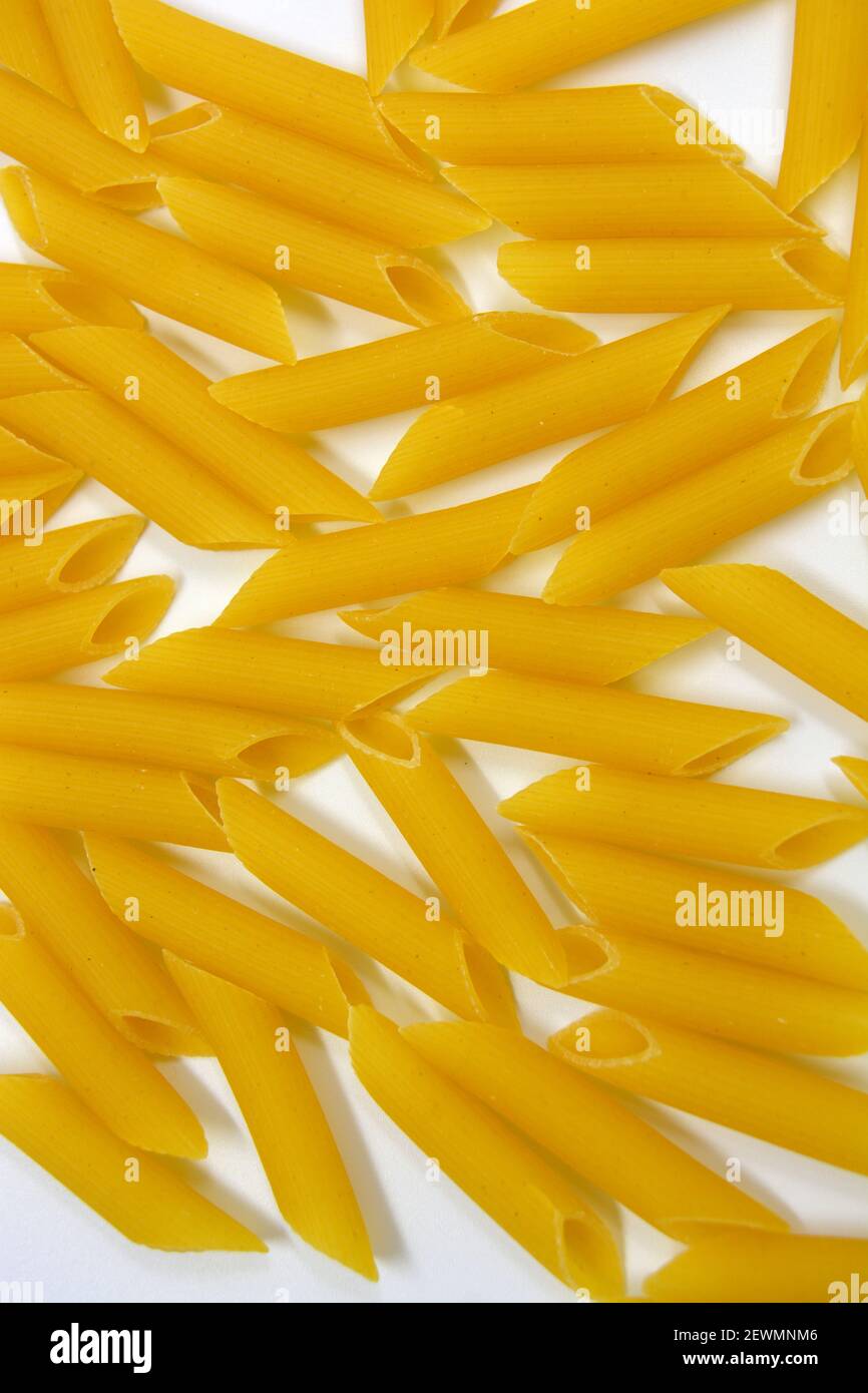 Food dry yellow Italian vermicelli, grain solid paste is located on a ...