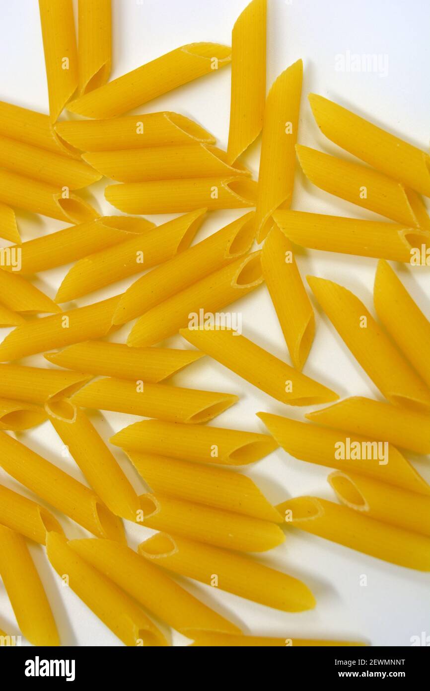 Food dry yellow Italian vermicelli, grain solid paste is located on a ...
