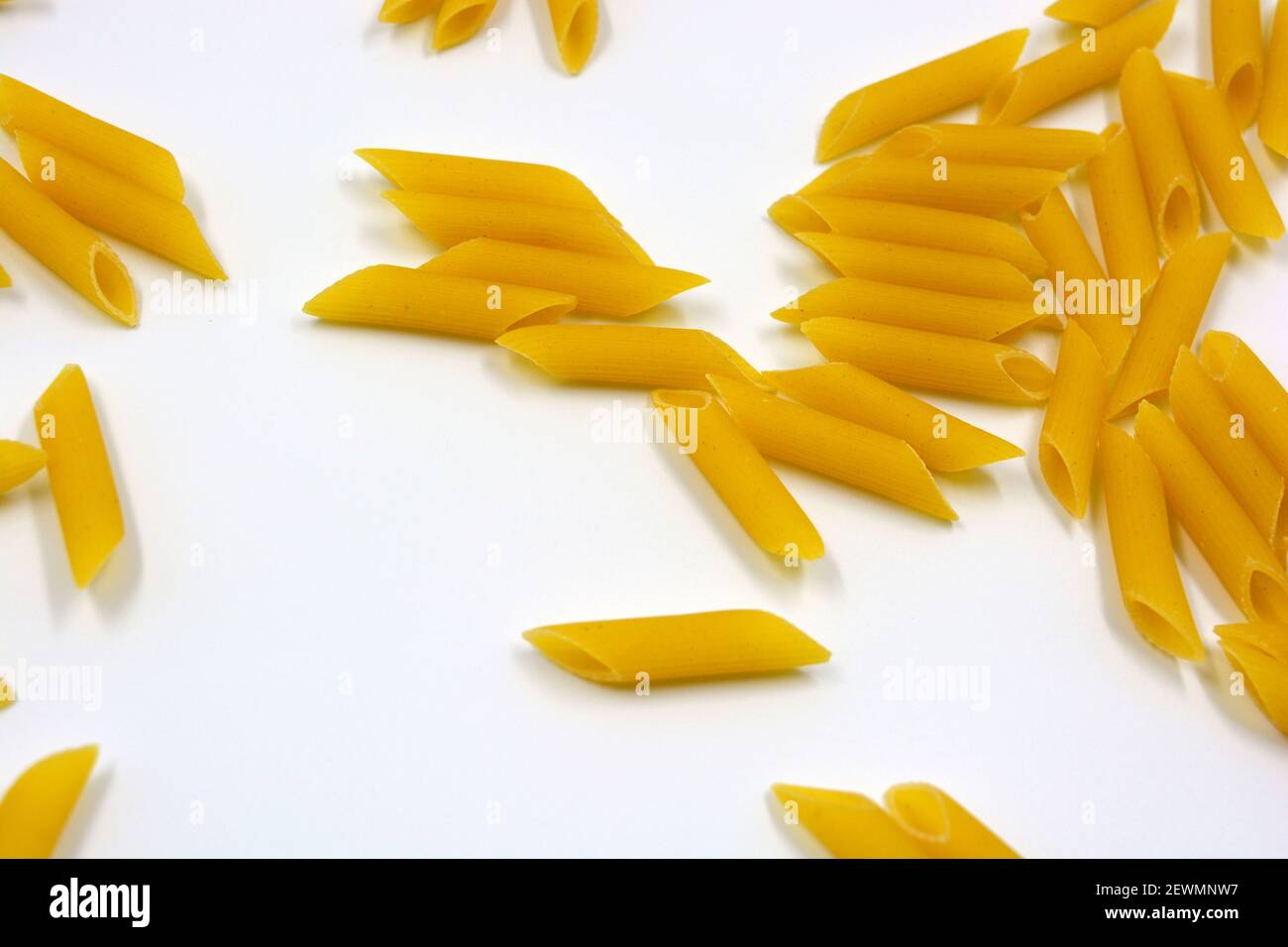 Food dry yellow Italian vermicelli, grain solid paste is located on a ...